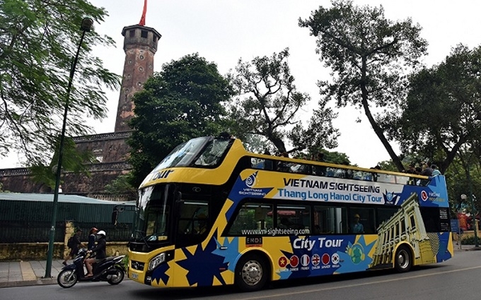 Double-decker tour buses piloted in two more localities - Viet Nam ...