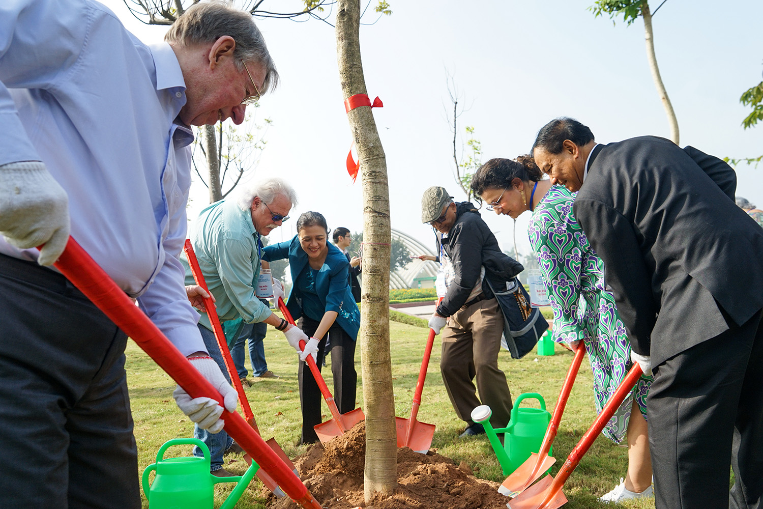 International delegates join tree-planting event to celebrate the Paris ...
